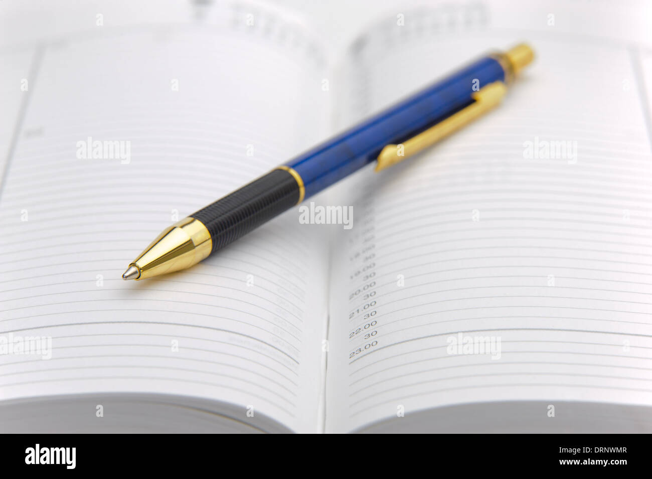 open calendar with pen Stock Photo - Alamy