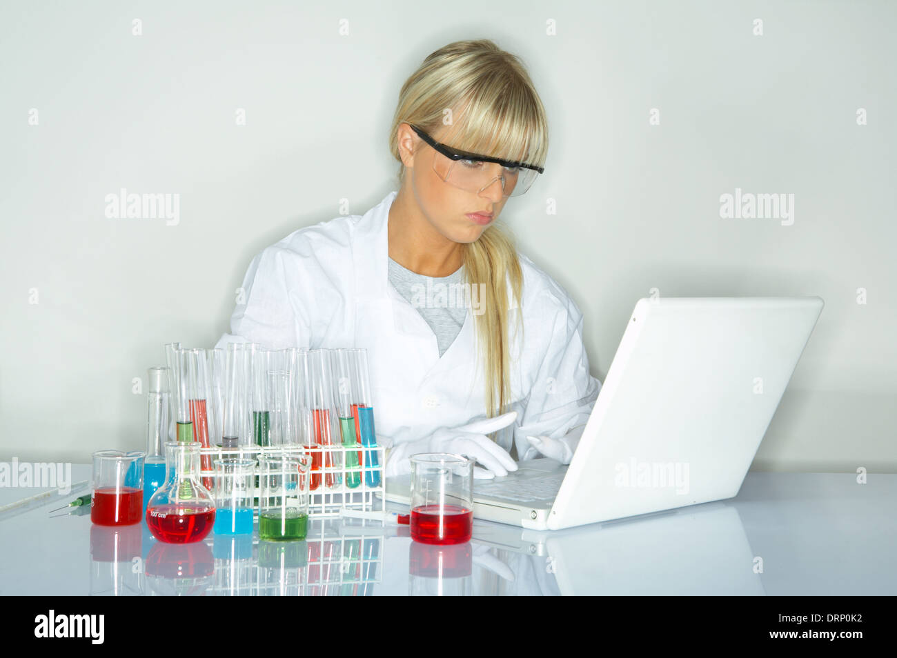 Female in lab Stock Photo - Alamy