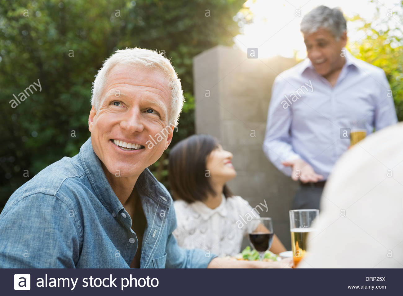 Enjoying their dinner party hi-res stock photography and images - Alamy