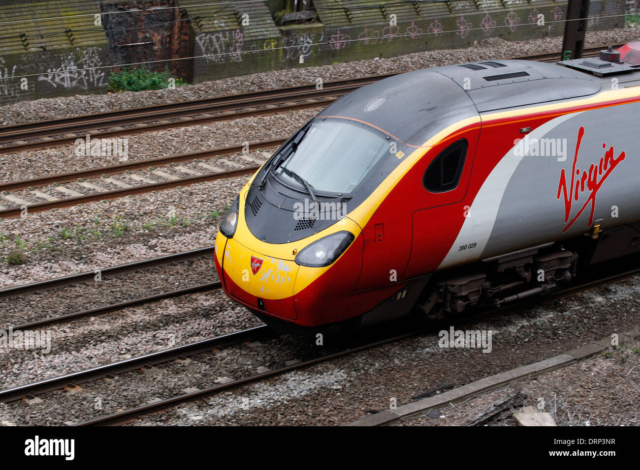 A Virgin train passes by in North London Stock Photo - Alamy