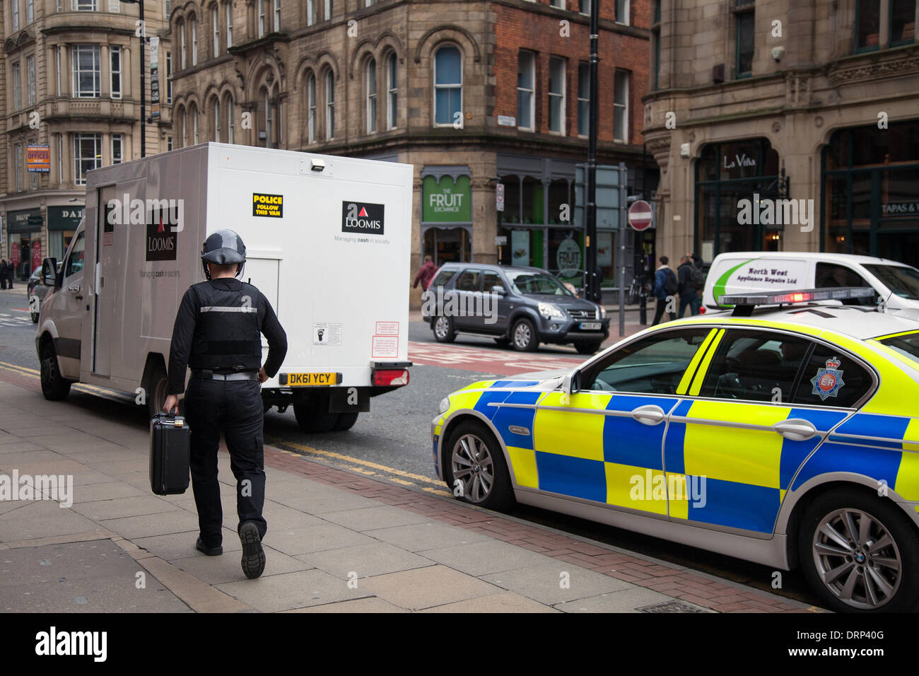 Police vans parked in street in city centre hi-res stock photography ...