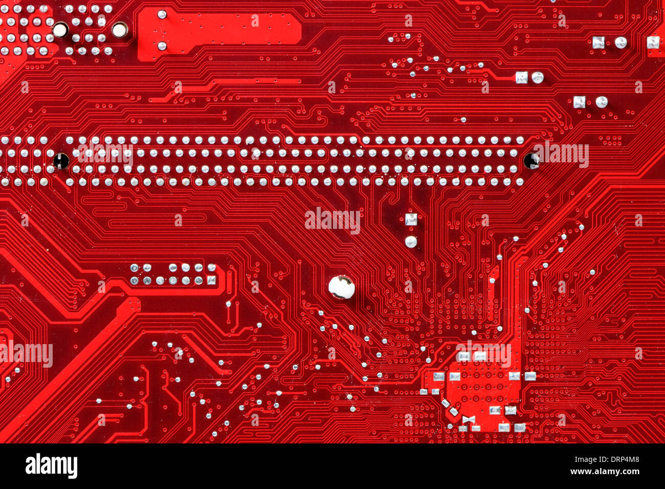 Closeup of a red printed circuit board Stock Photo - Alamy