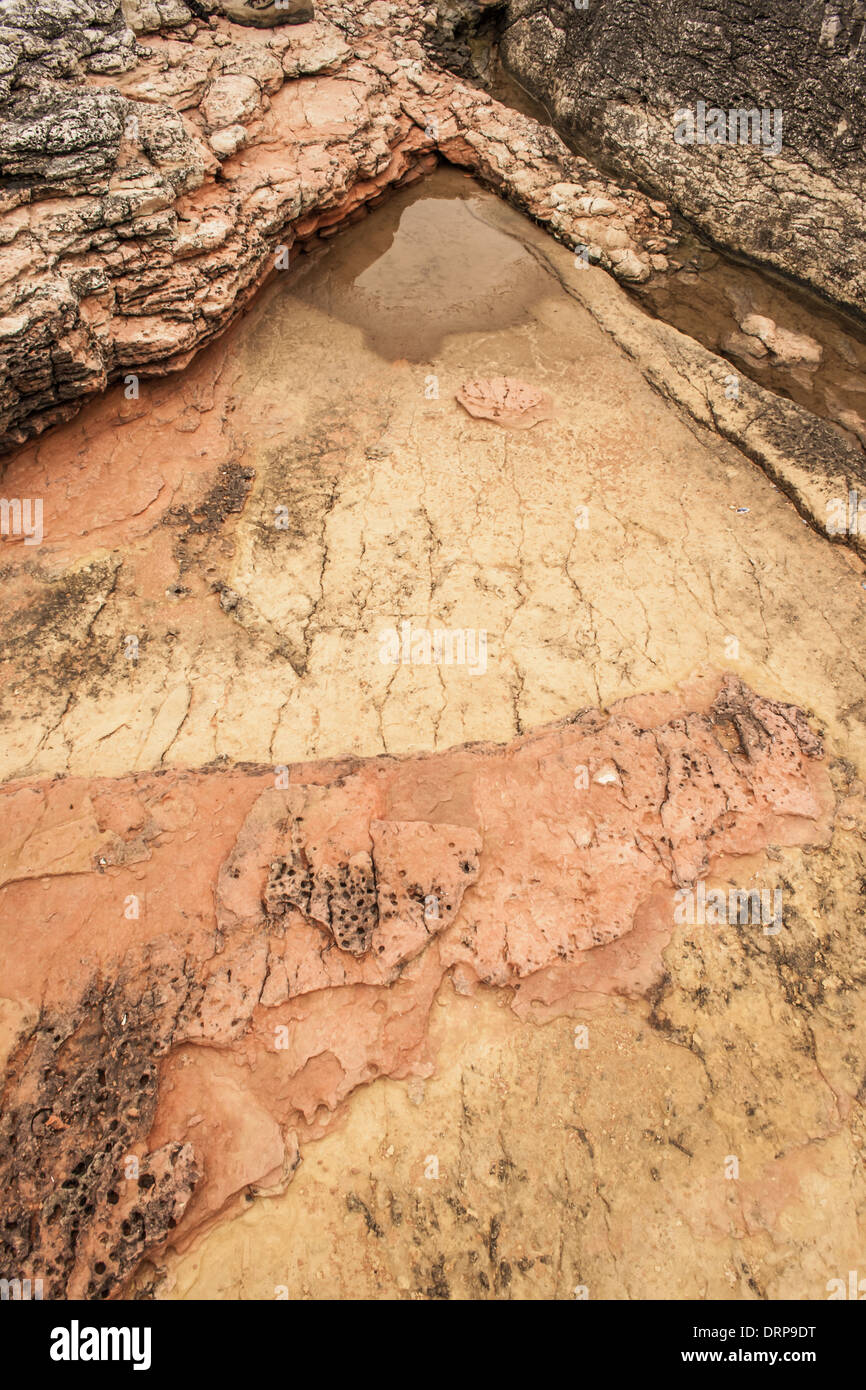 View of different colored rock layers in a river bed Stock Photo - Alamy