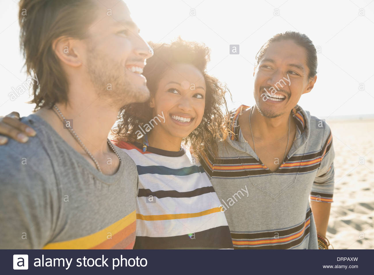 Friends on the beach hi-res stock photography and images - Alamy