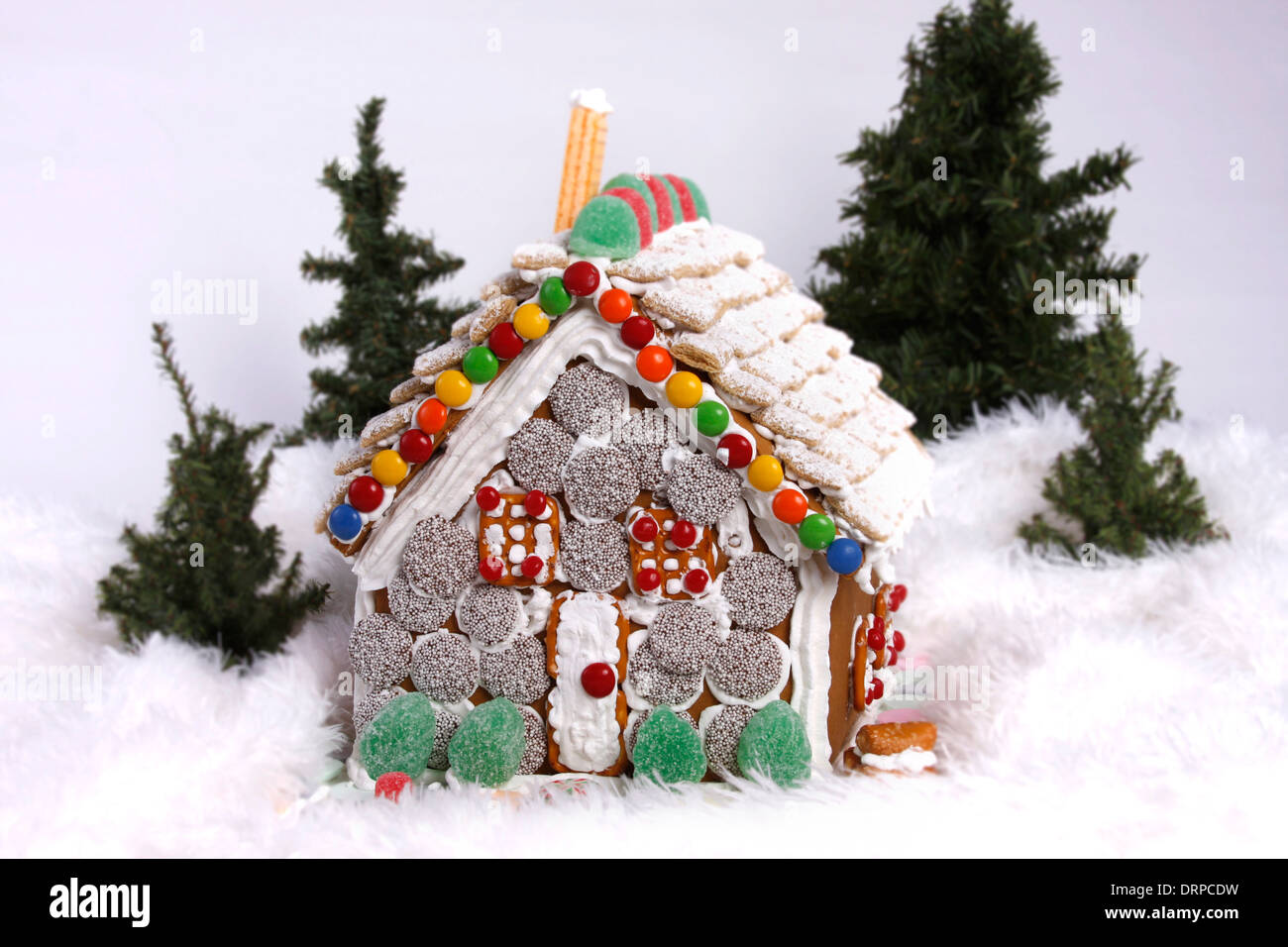 Gingerbread house with trees Stock Photo - Alamy