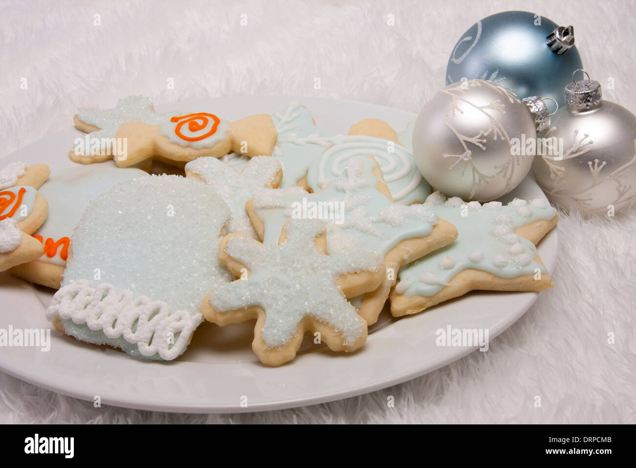 Christmas cookies plate and ornaments Stock Photo - Alamy