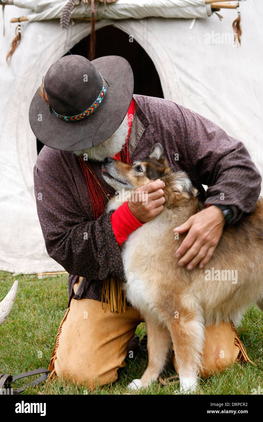 A mountainman greeting his dog Stock Photo - Alamy