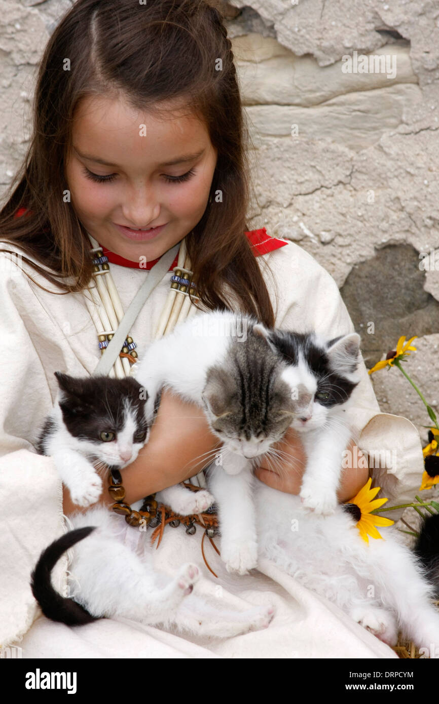 Native american girl holding kitten hi-res stock photography and images ...