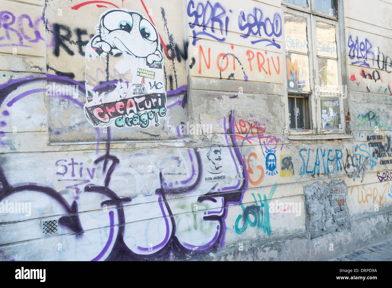 Graffiti street art in Bucharest, Romania Stock Photo - Alamy