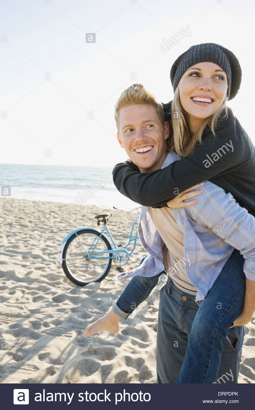 Piggybacking woman hi-res stock photography and images - Alamy