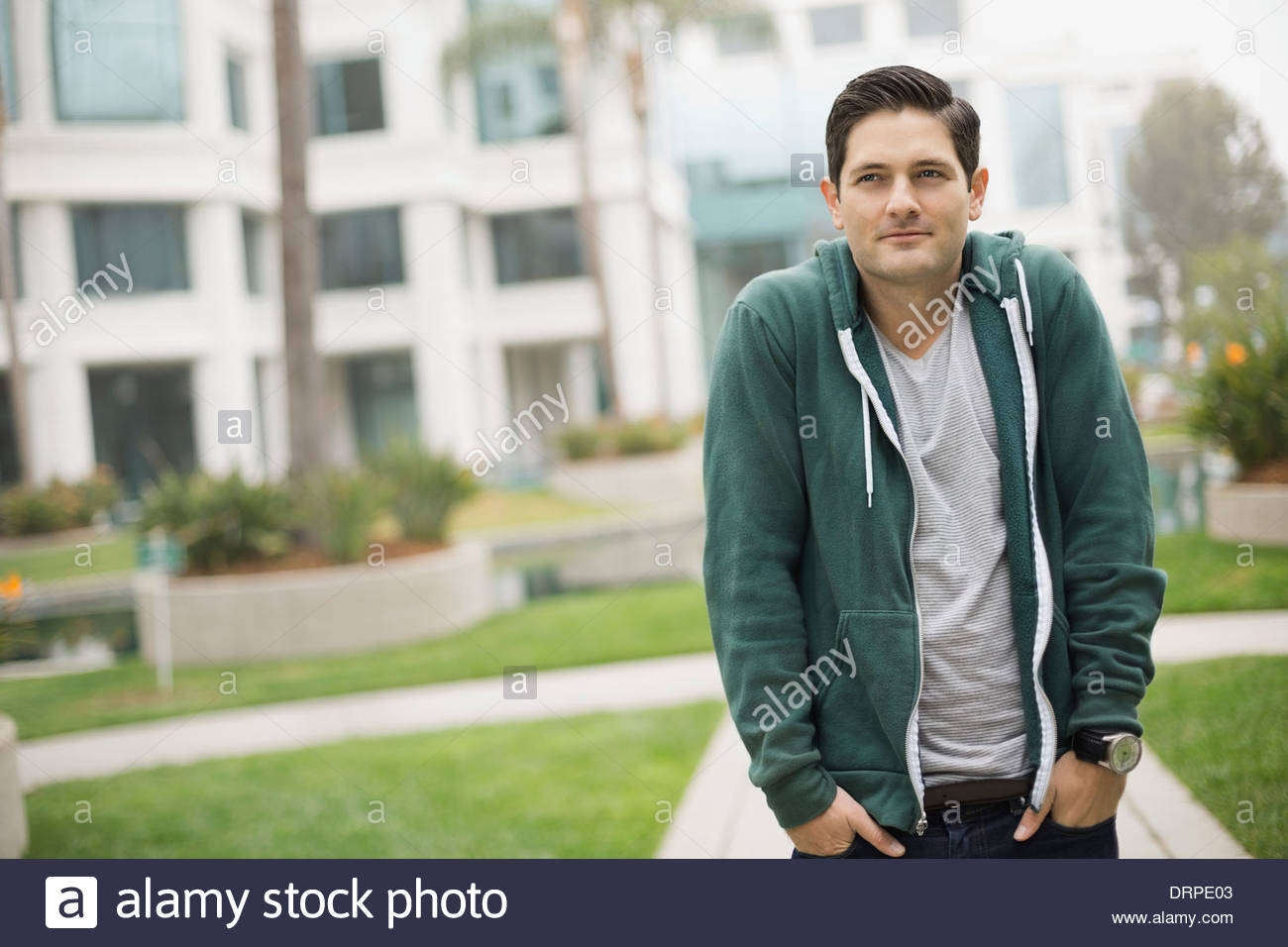 Hands in jacket pockets hi-res stock photography and images - Alamy