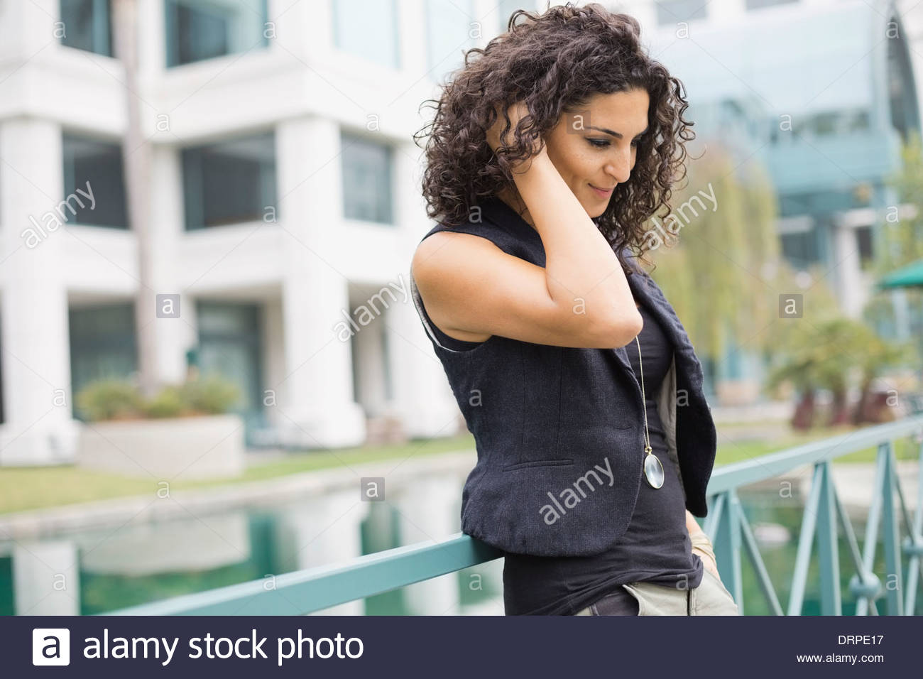 Standing against hi-res stock photography and images - Alamy