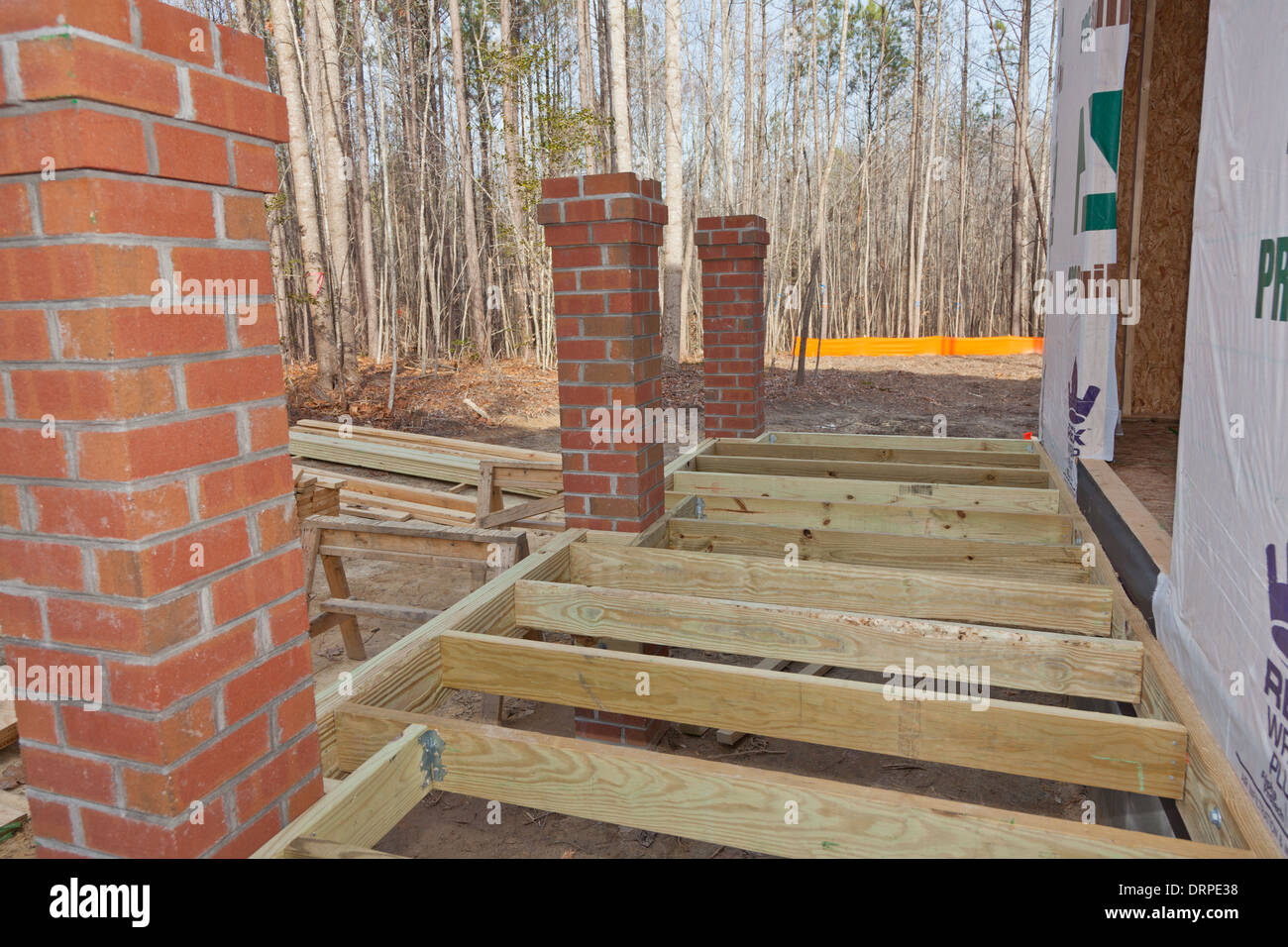 New home construction wood framing details of a porch with brick ...