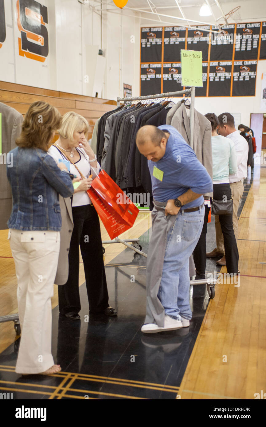 Men get new business clothing from Working Wardrobes, a organization helping the unemployed ...
