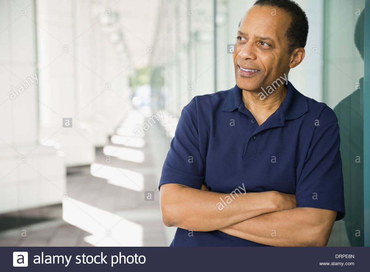 Man leaning against window hi-res stock photography and images - Alamy