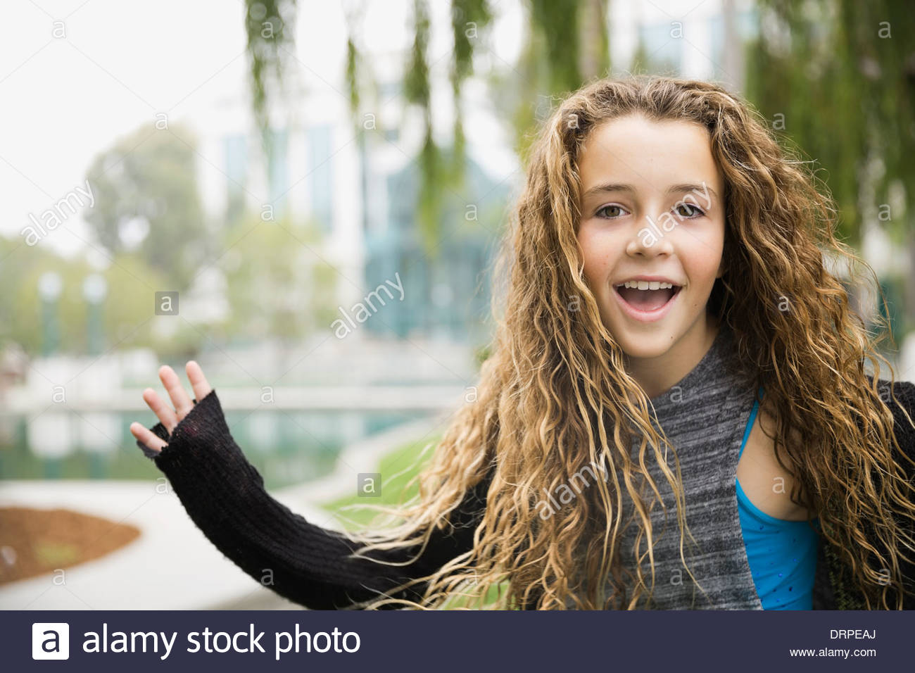 Girl standing outdoors hi-res stock photography and images - Alamy