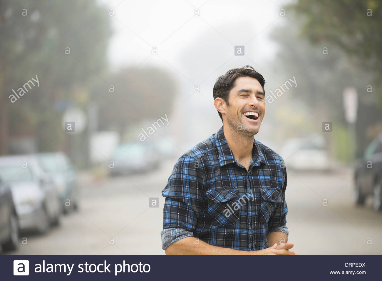 Laughing candid hi-res stock photography and images - Alamy
