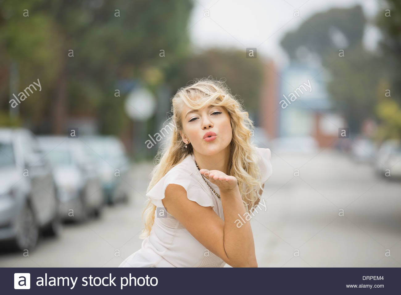 Blowing kiss woman hi-res stock photography and images - Alamy