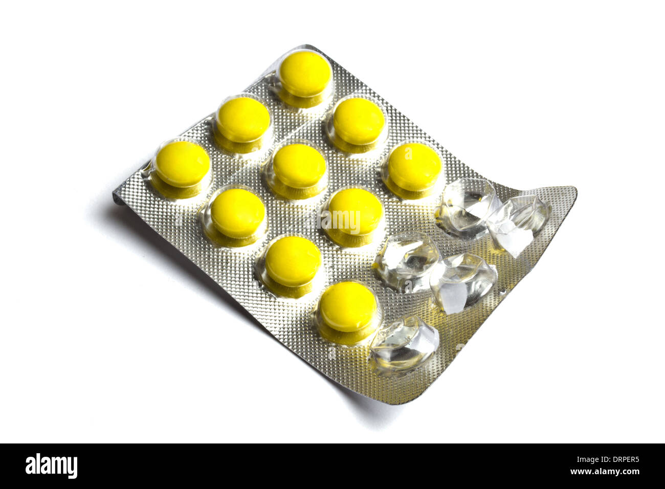 Yellow Pills isolated on white Stock Photo - Alamy