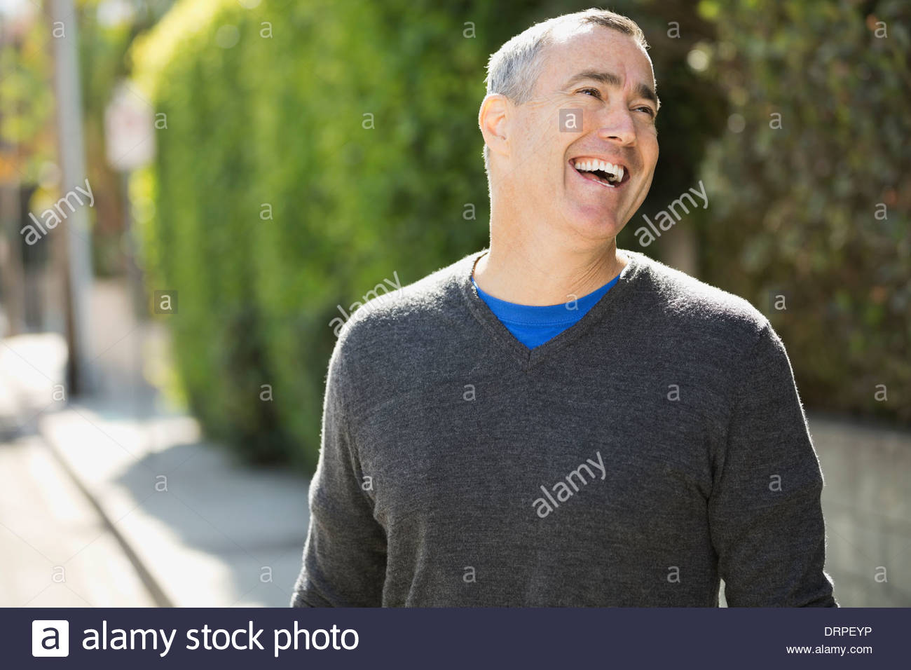 Laughing candid hi-res stock photography and images - Alamy