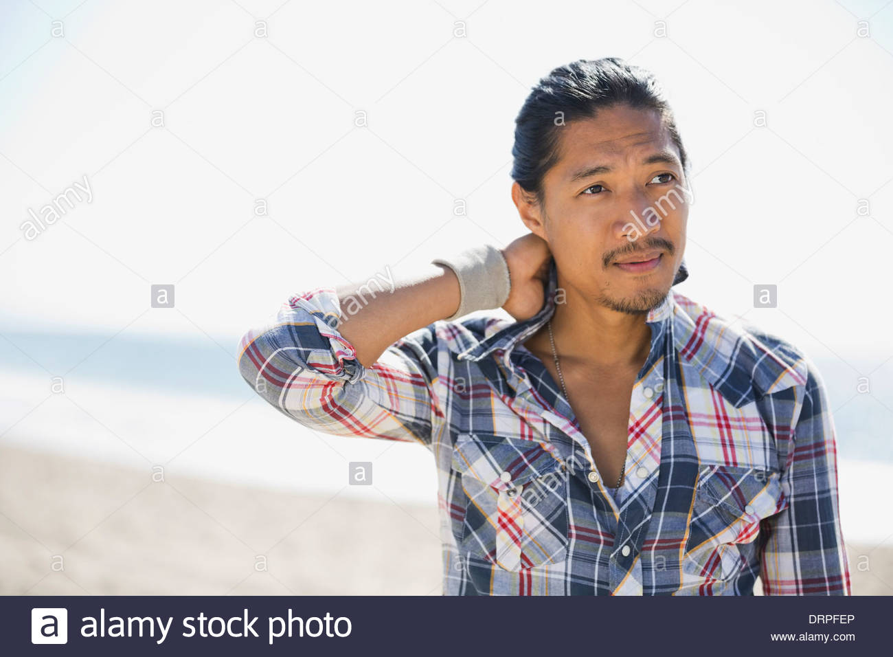 Hand behind head hi-res stock photography and images - Alamy