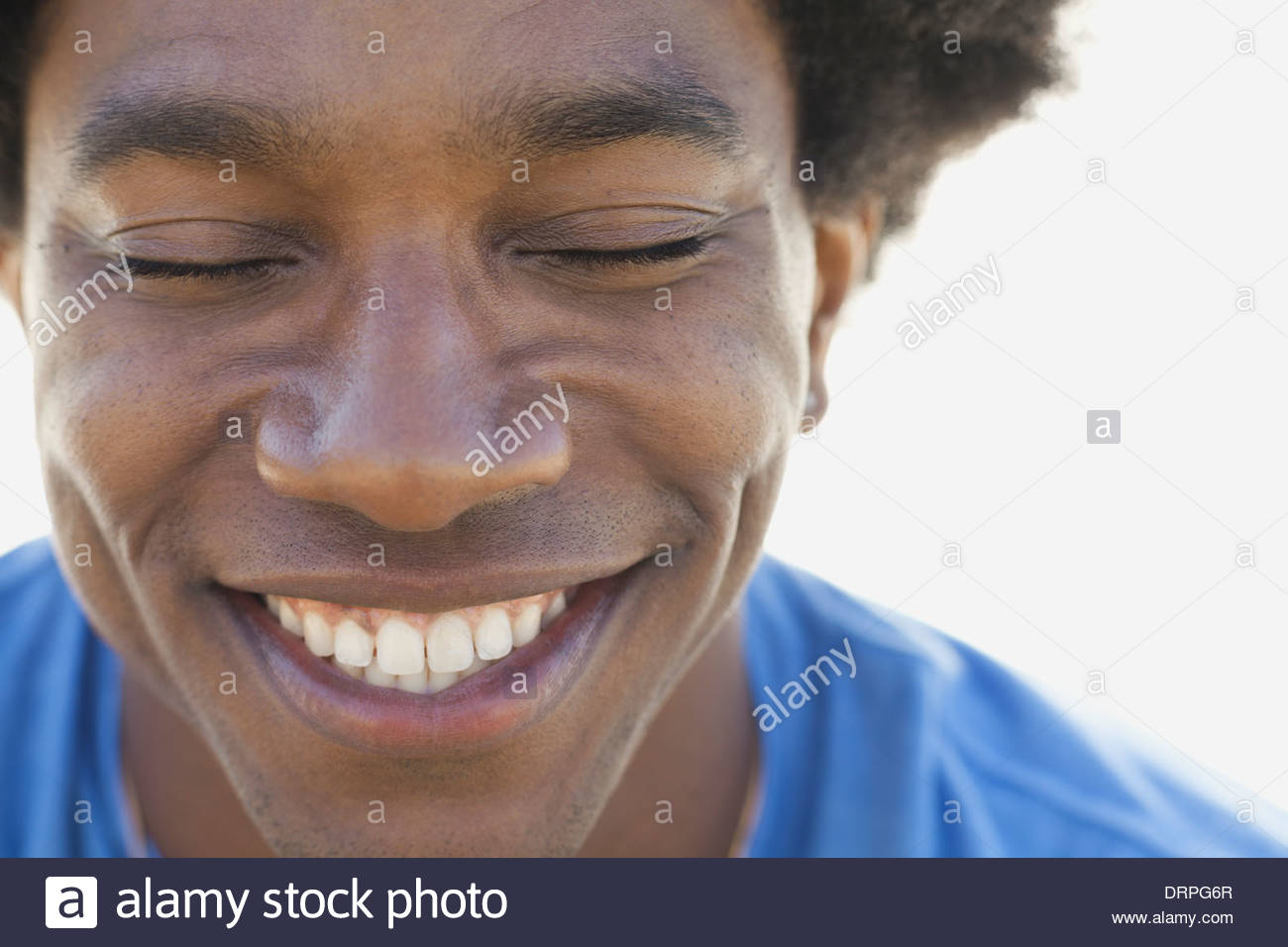 Eyes closed smiling hi-res stock photography and images - Alamy