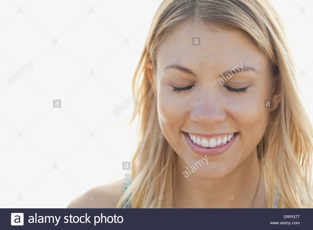 Smiling eyes closed hi-res stock photography and images - Alamy