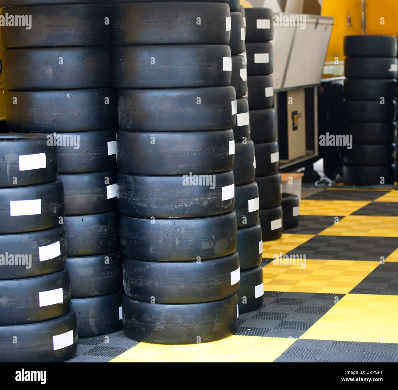 Formula One 1 race tires and wheels in boxes Stock Photo - Alamy