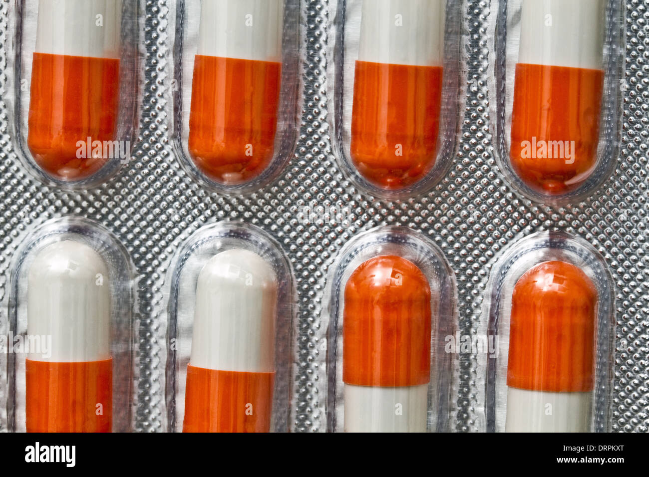 Red and white capsules hi-res stock photography and images - Alamy