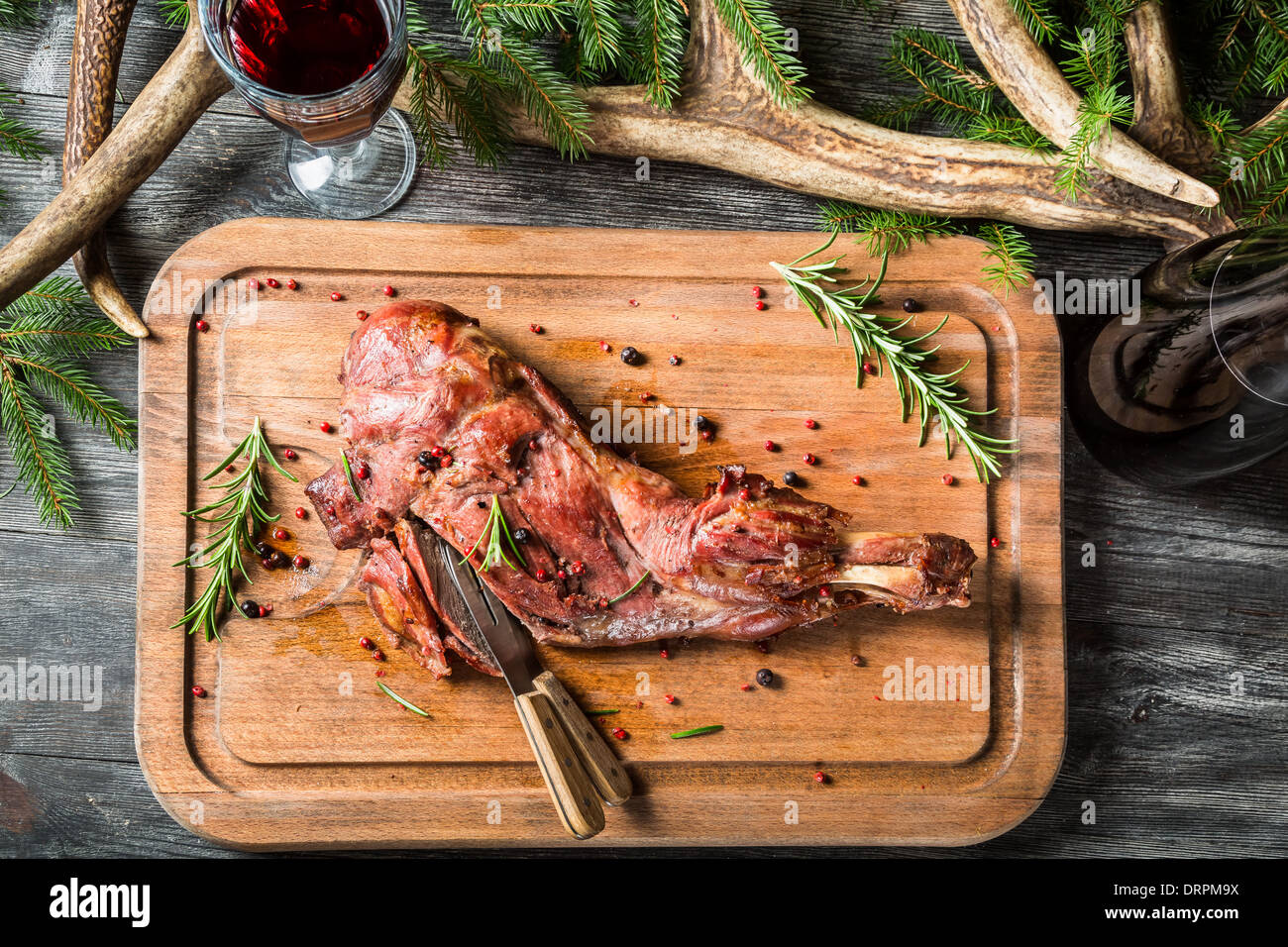 Fresh venison tastes best with red wine Stock Photo - Alamy