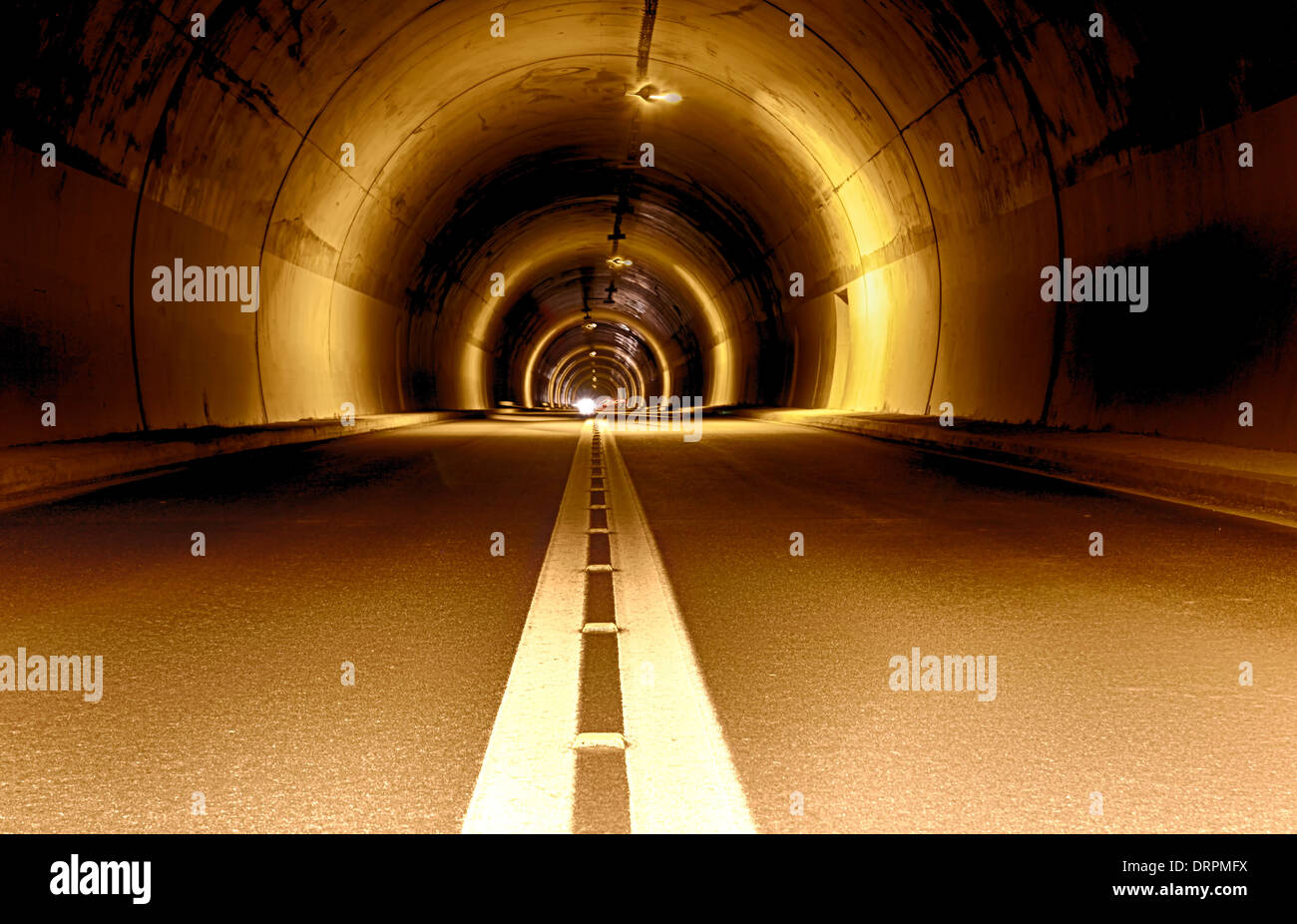long tunnel at night and coming car from far Stock Photo - Alamy