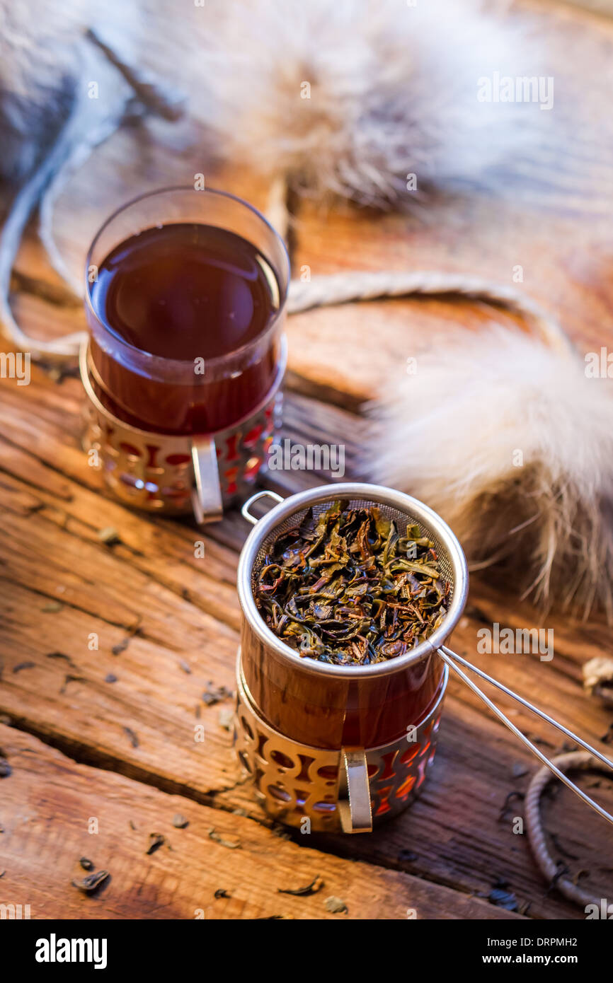 Warming tea served in old-fashioned Stock Photo - Alamy