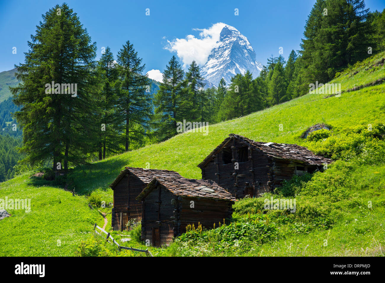 Chalet barns below the Matterhorn mountain in the Swiss Alps near ...