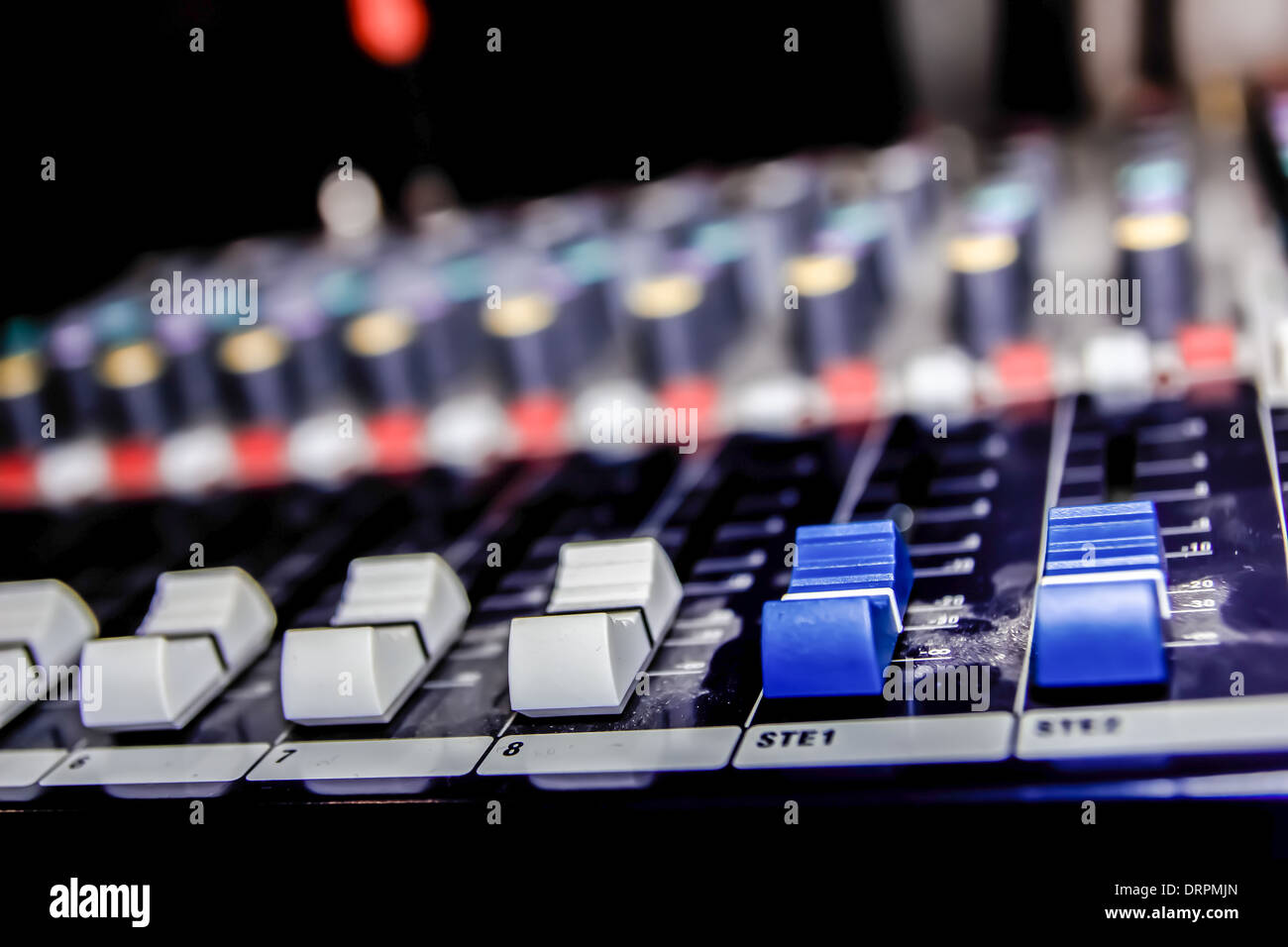 professional music mixer with channels in studio Stock Photo - Alamy