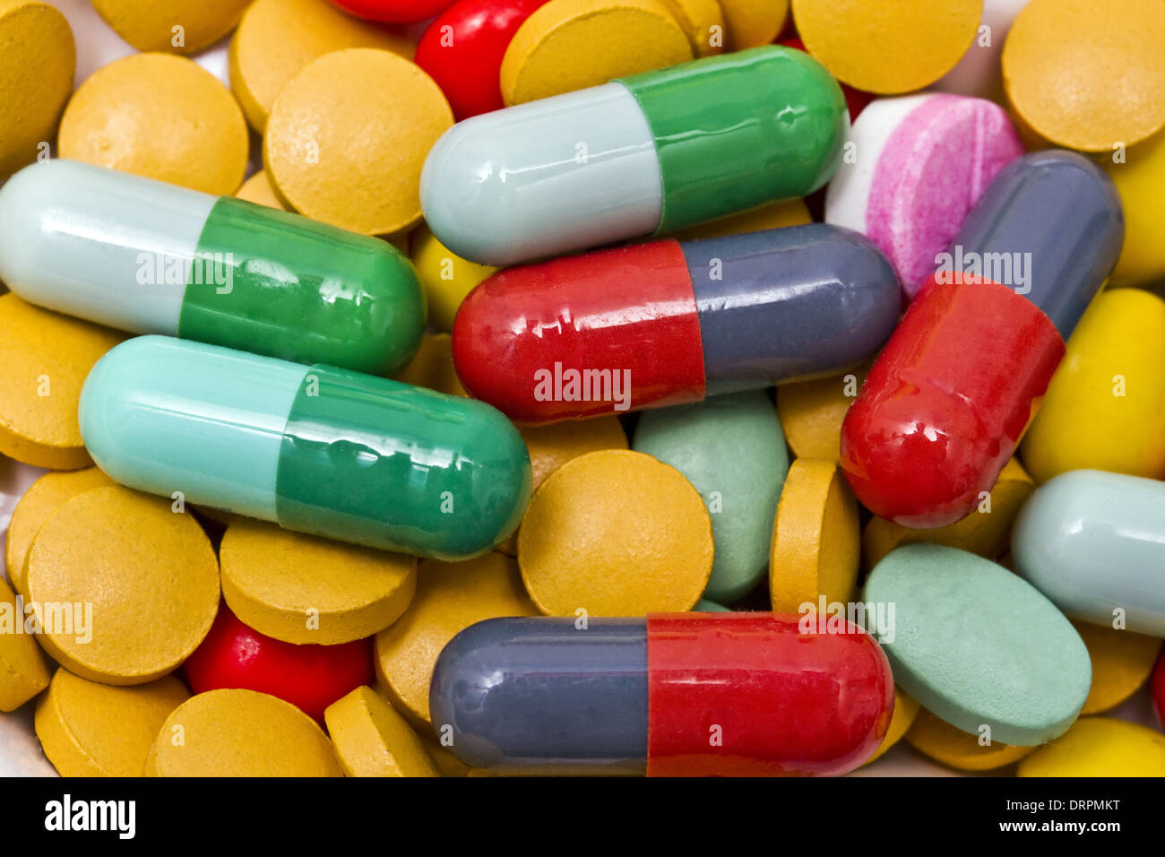 Multi color pills closeup Stock Photo - Alamy
