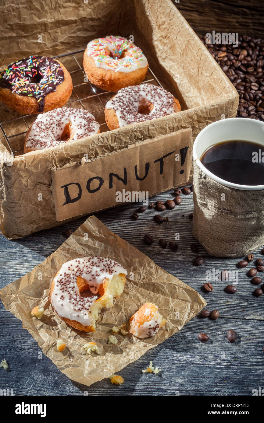 Fresh donuts to take away Stock Photo - Alamy
