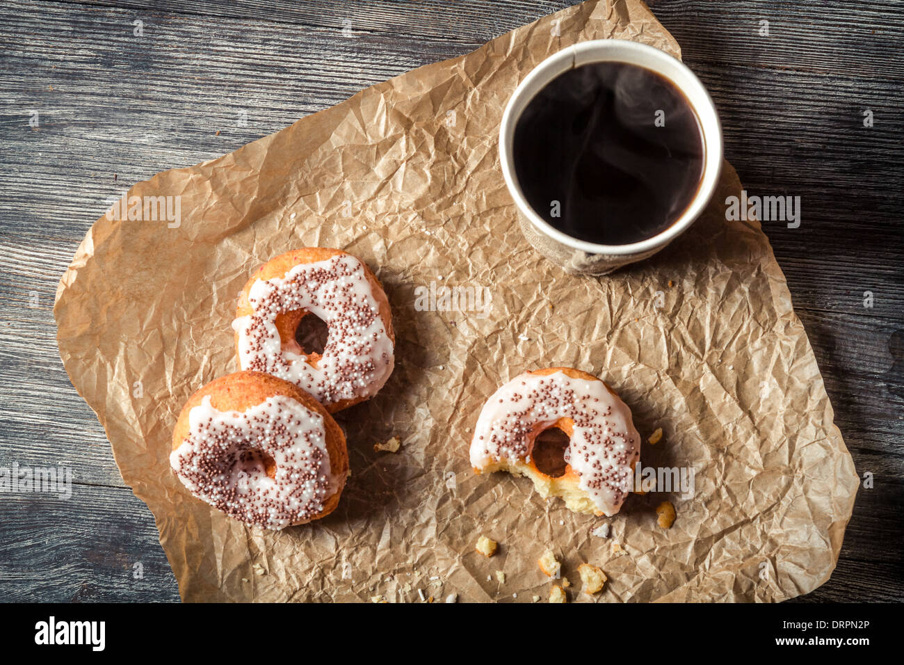 Donuts and coffee background Stock Photo - Alamy