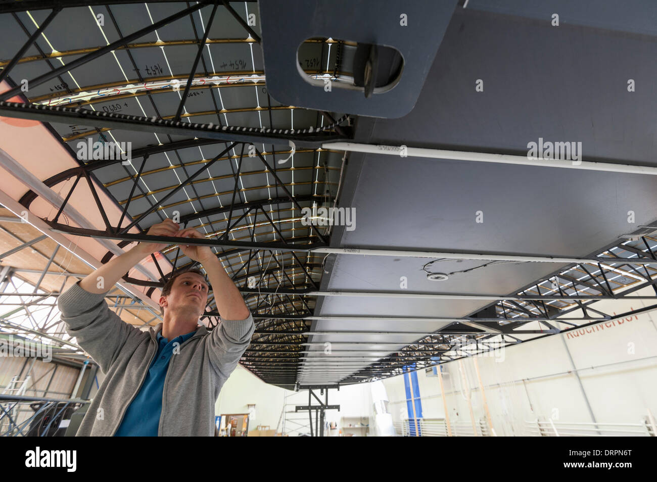 Engineer working on aircraft wing hi-res stock photography and images ...