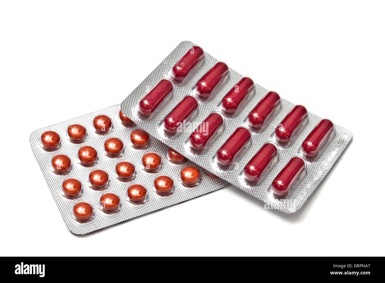Red pills and capsules Stock Photo - Alamy