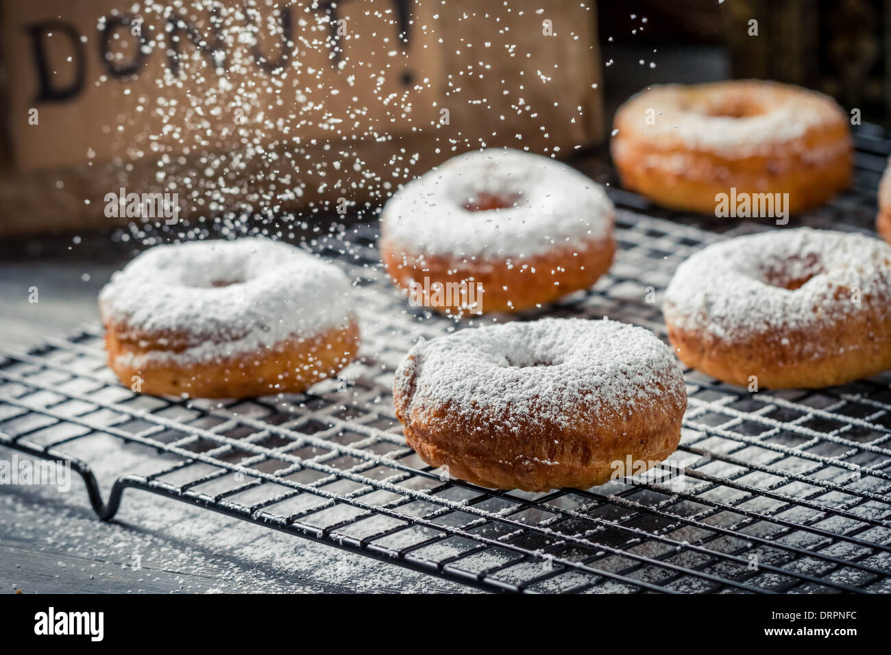 Donuts decorated with powder sugar Stock Photo - Alamy