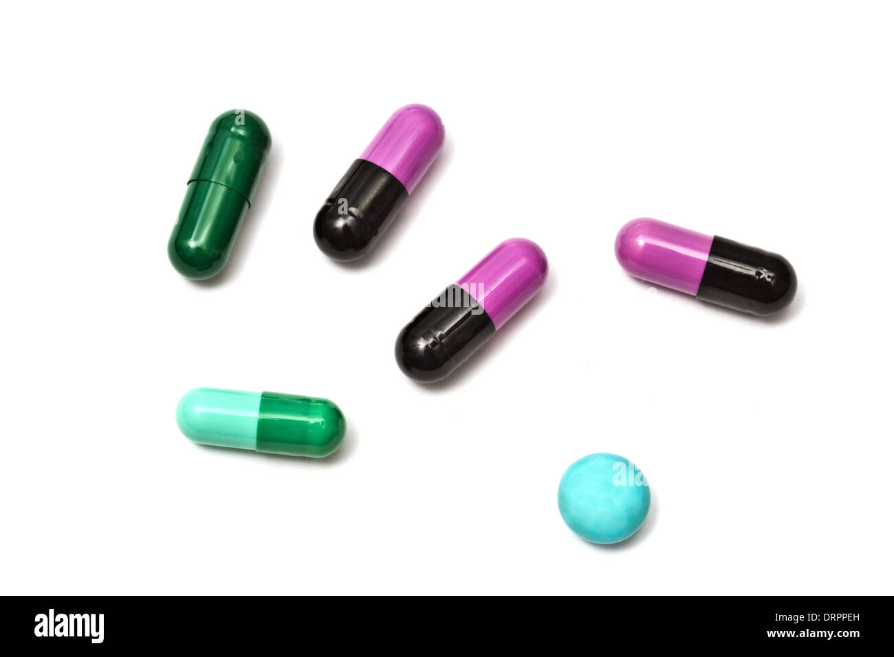 Colorful medicines isolated on white Stock Photo - Alamy