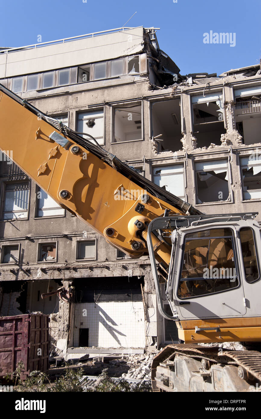 Demolition building breaking house digger hi-res stock photography and ...