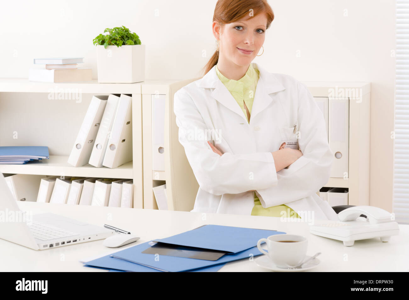 Doctor office - portrait female physician Stock Photo - Alamy