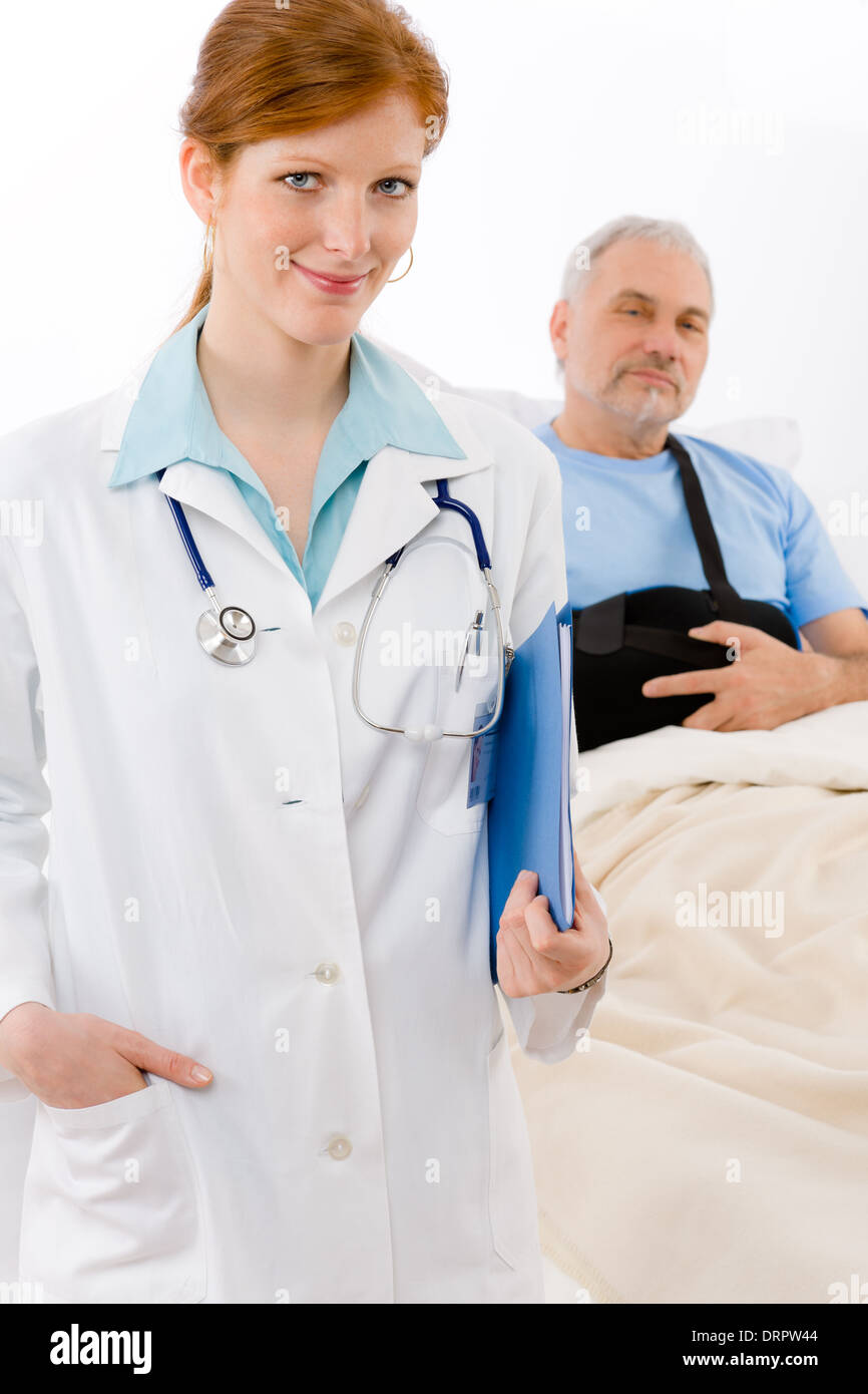 Hospital - doctor examine patient broken arm Stock Photo - Alamy