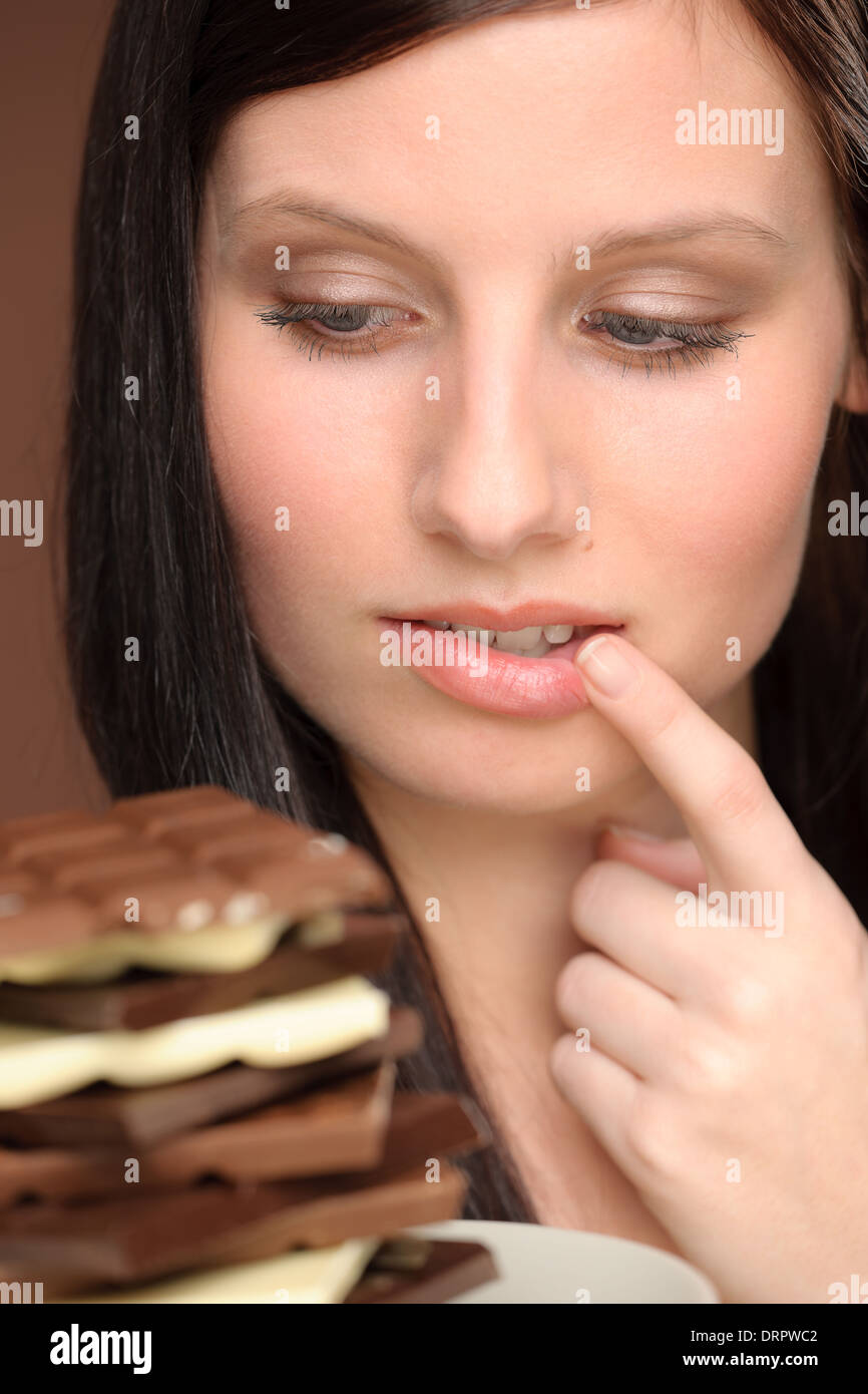 Chocolate - portrait young woman desire Stock Photo - Alamy