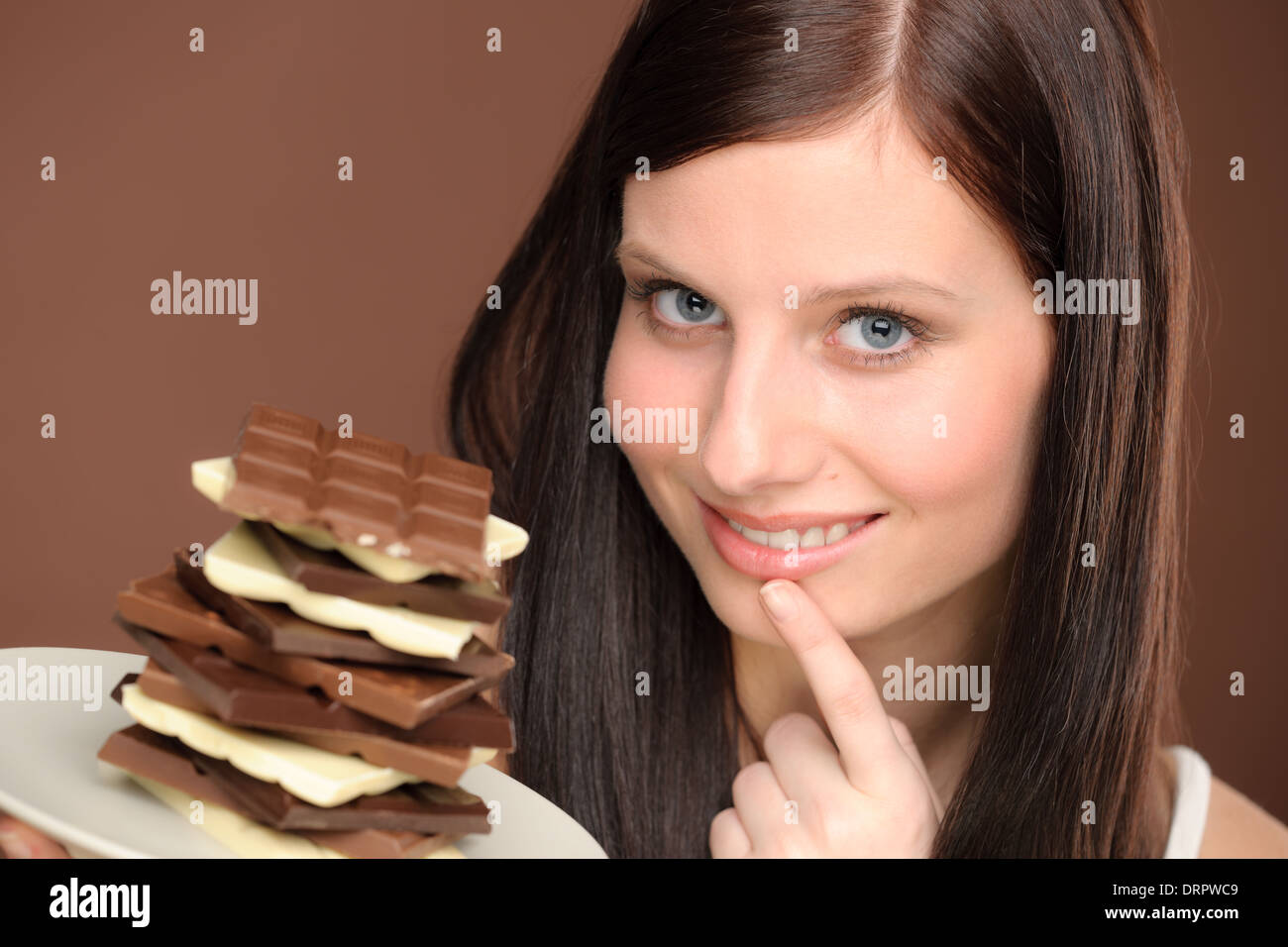 Chocolate - portrait young woman desire Stock Photo - Alamy