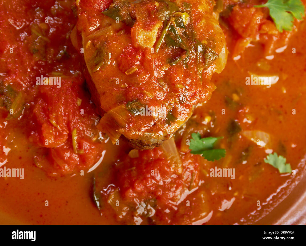 Hraime - Libyan prepared fish . fried mullet in tomato sauce with spice ...
