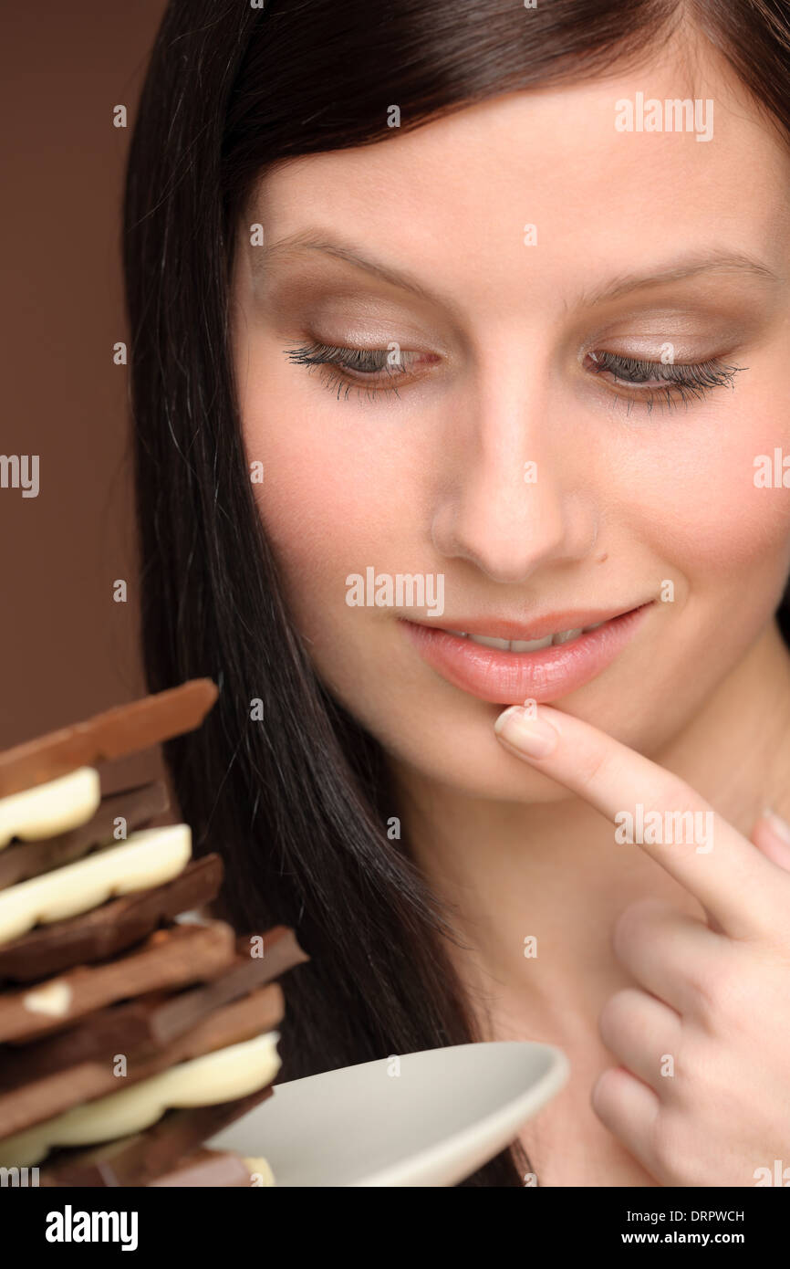 Chocolate - portrait young woman temptation Stock Photo - Alamy