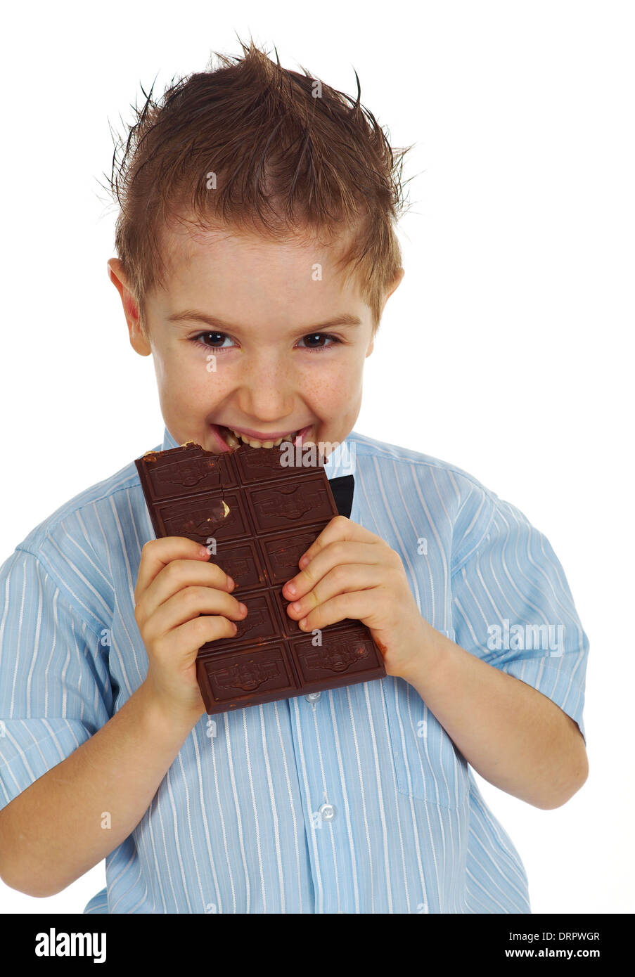 Smiling funny young kid eating chocolate.White isolated Stock Photo - Alamy