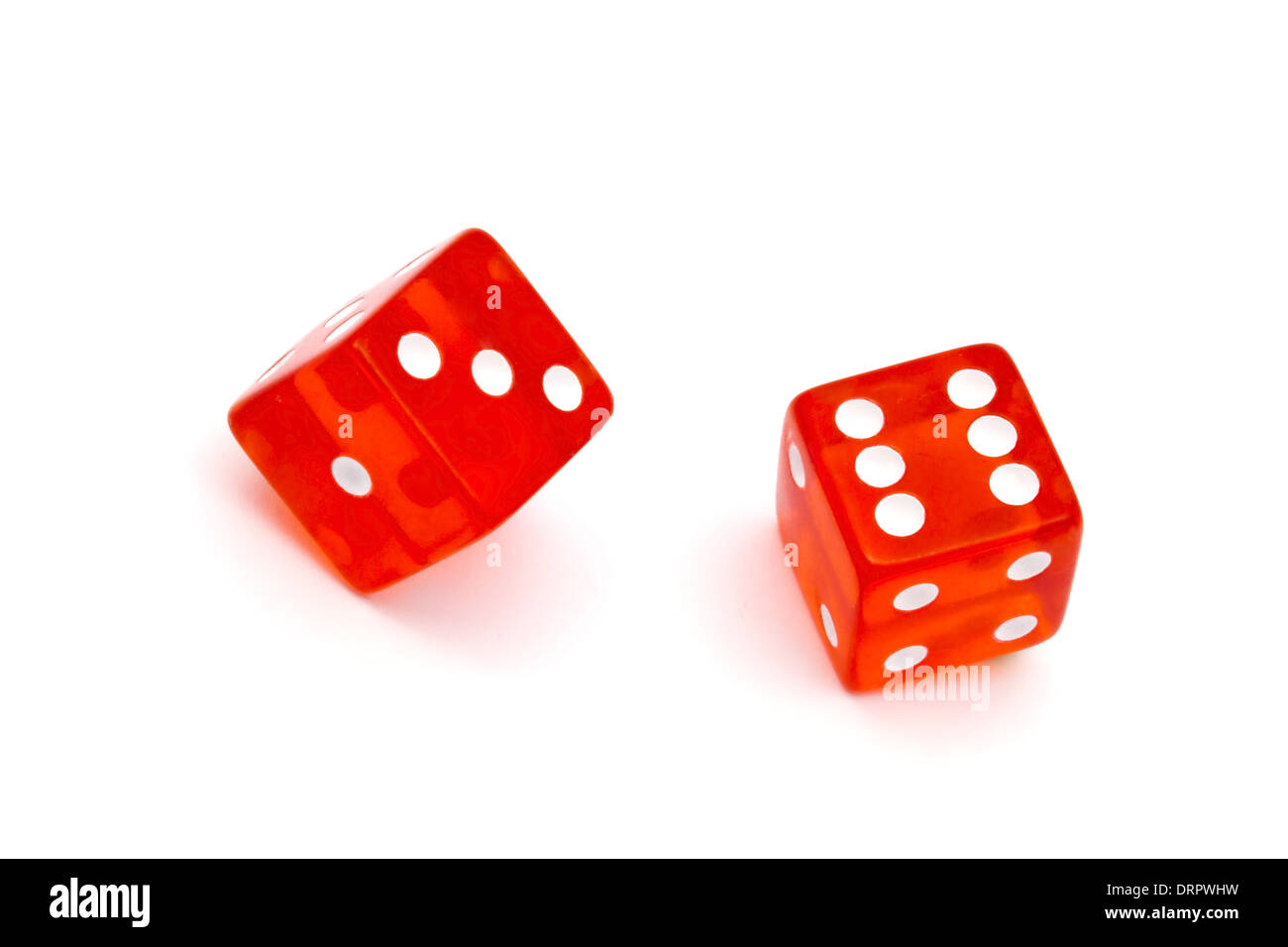 Red dice isolated on white background Stock Photo - Alamy